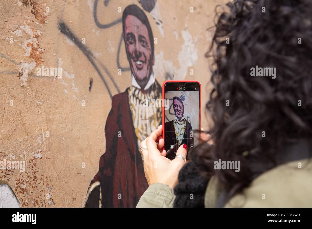 A new mural by Italian streetartist Harry Greb in Rome portrays the ...