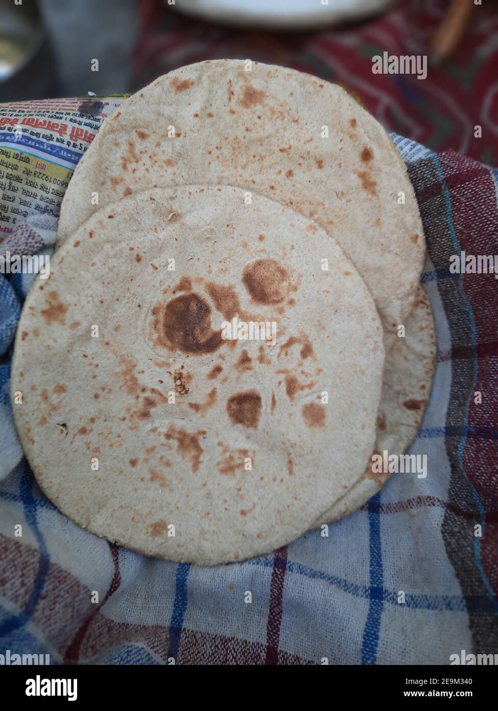 Top view of freshly baked delicious flatbreads on a fabric Stock Photo ...