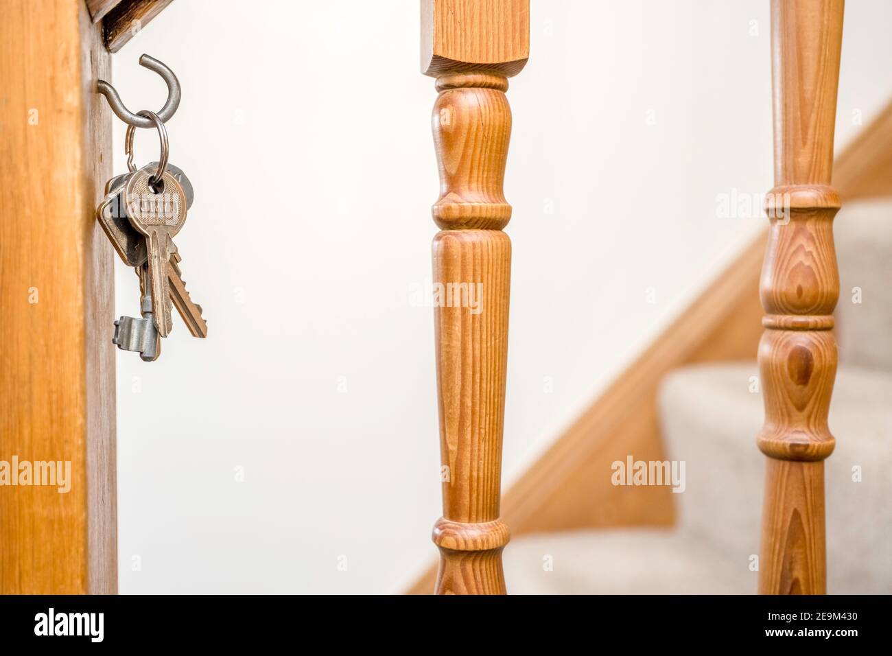 Keys hook at the stairs Stock Photo - Alamy