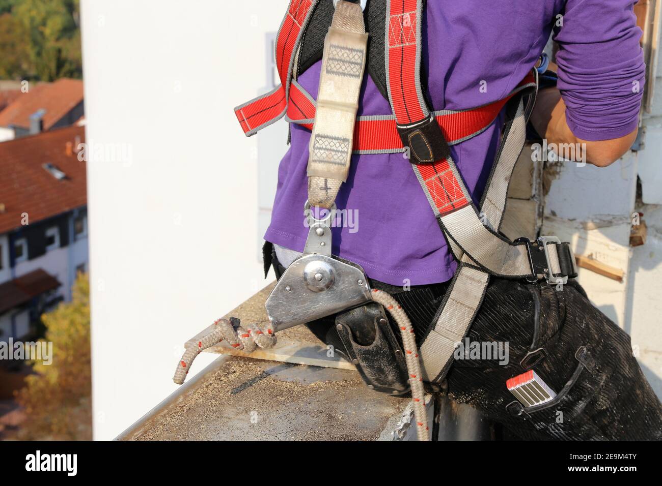 Roofer with fall protection Stock Photo - Alamy