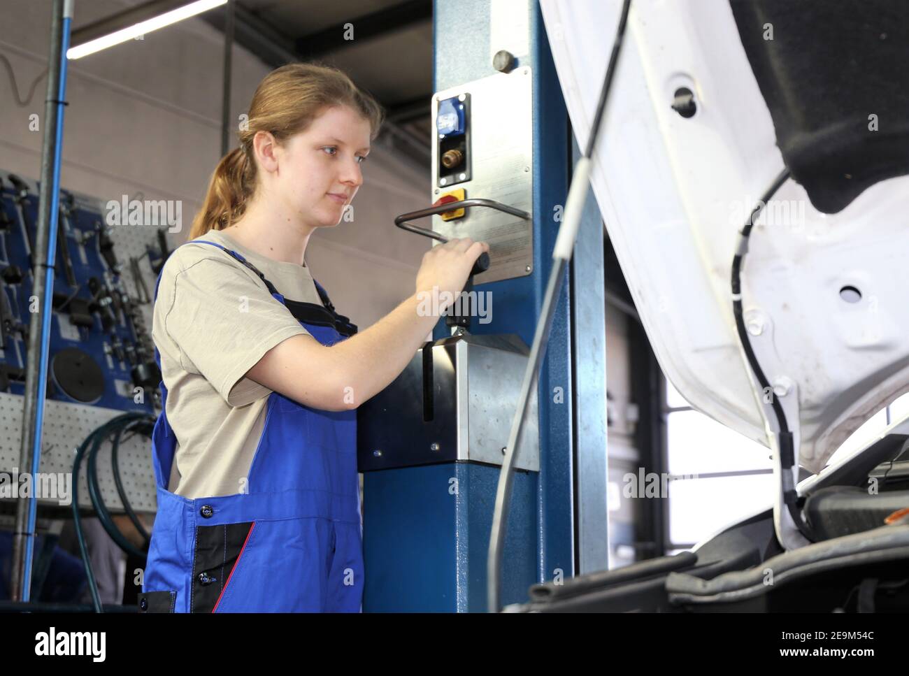 Symbol image: Woman in male-dominated profession: Car mechanic (model ...