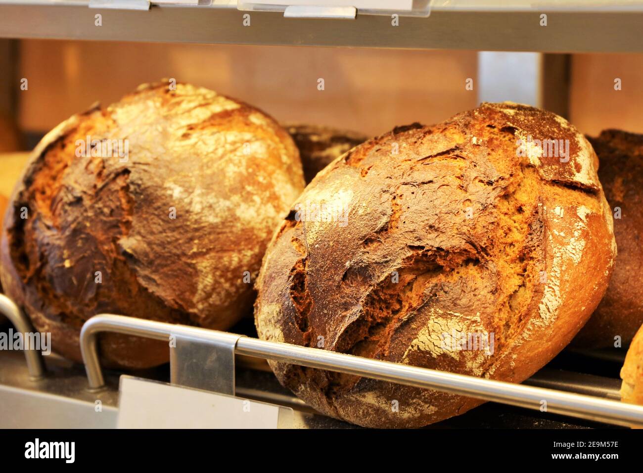 Bakery counter with fresh and crusty bread Stock Photo - Alamy