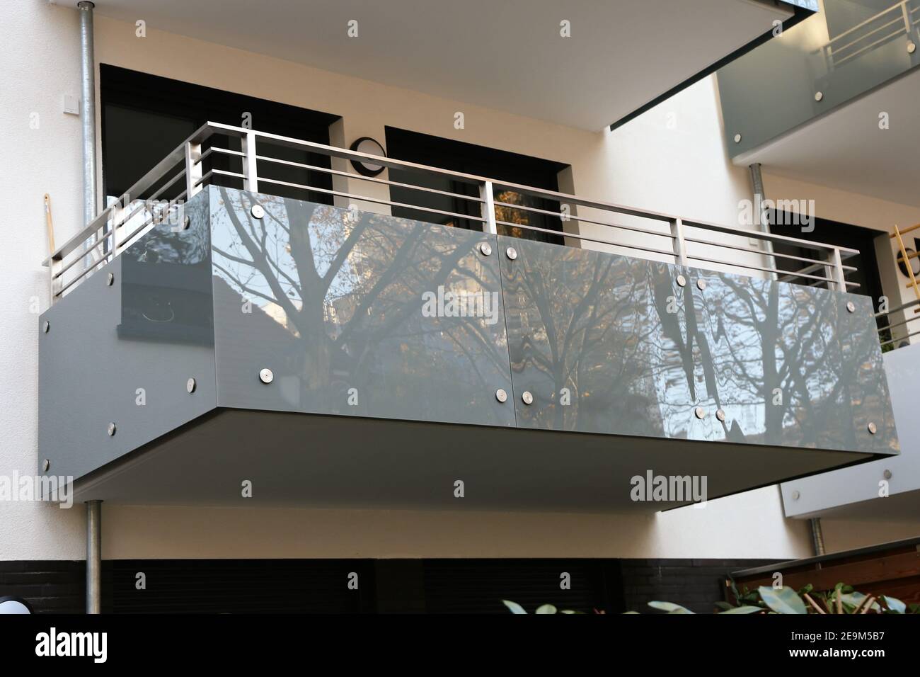 Balconies on a large apartment building Stock Photo - Alamy