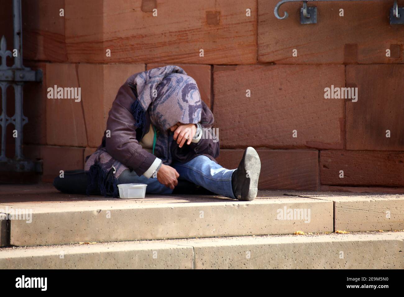 Woman begging for money (Germany Stock Photo - Alamy