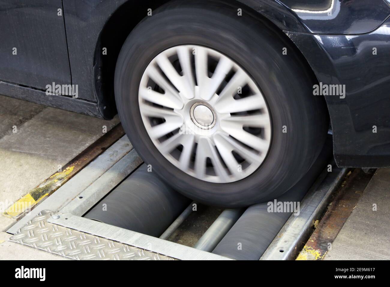 Car on the brake test bench (brake test Stock Photo - Alamy