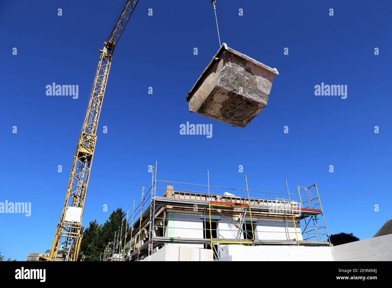 A container for the disposal of construction waste is placed on a ...