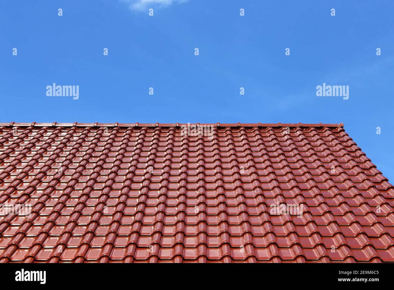 New tile roof on a residential house Stock Photo - Alamy