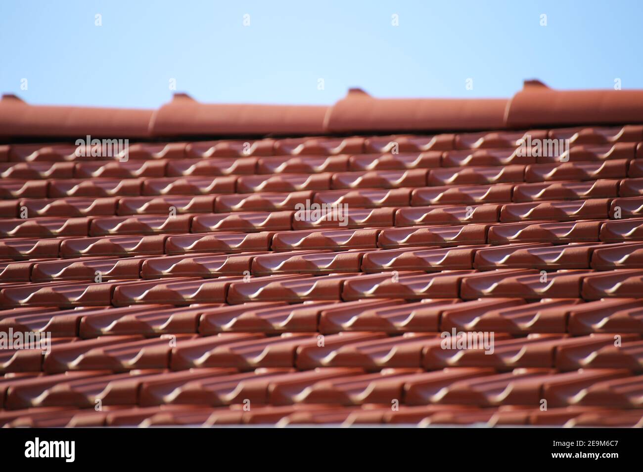 New tile roof on a residential house Stock Photo - Alamy