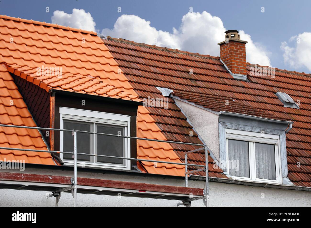 Semi-detached house with old roof and with renovated roof Stock Photo ...