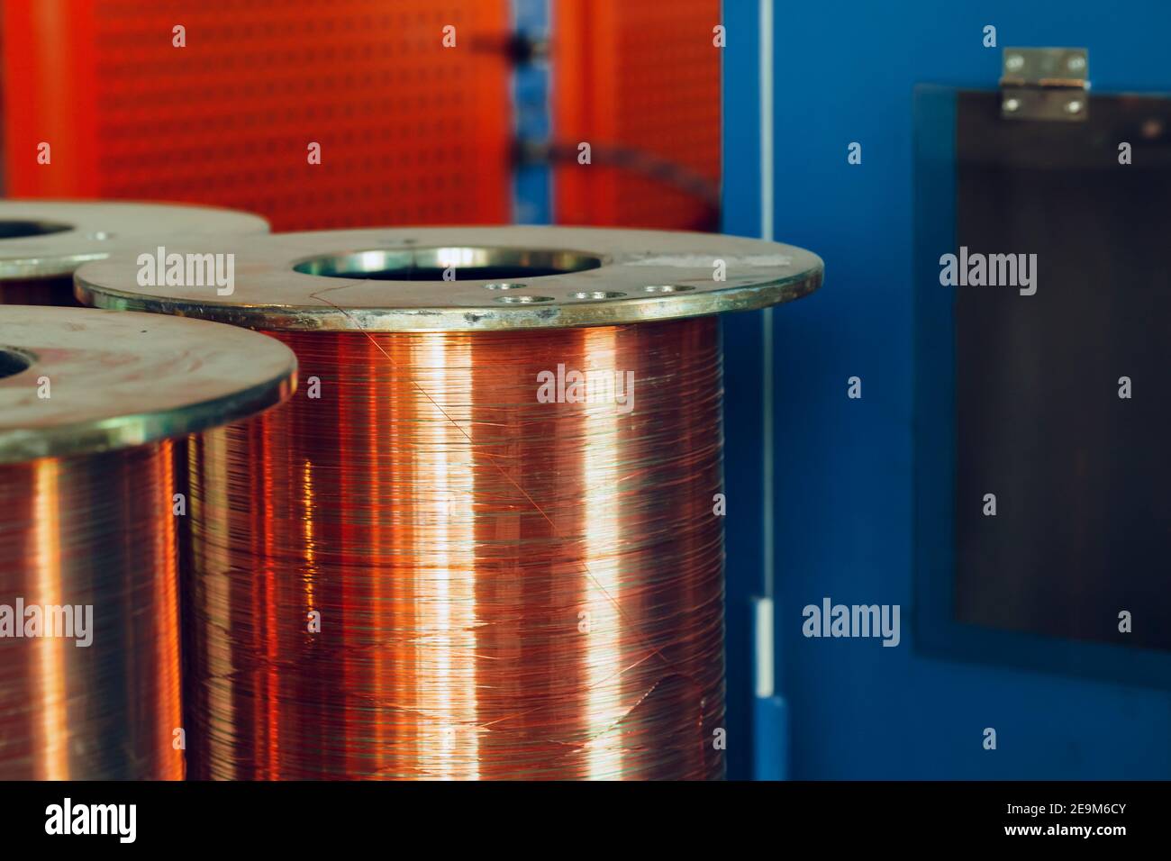 Copper wire reels in cable factory close up Stock Photo - Alamy