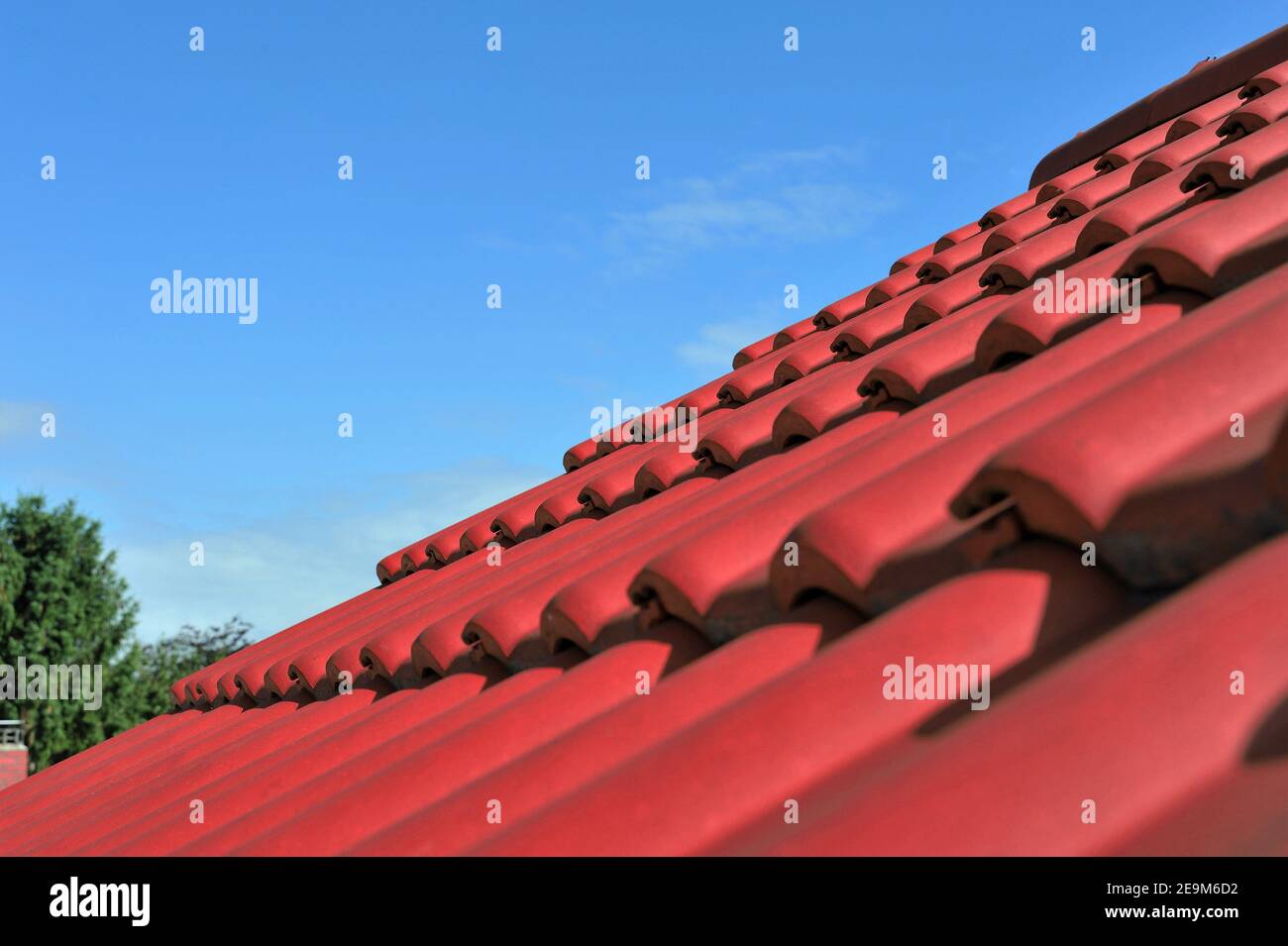 New tile roof on a residential house Stock Photo - Alamy