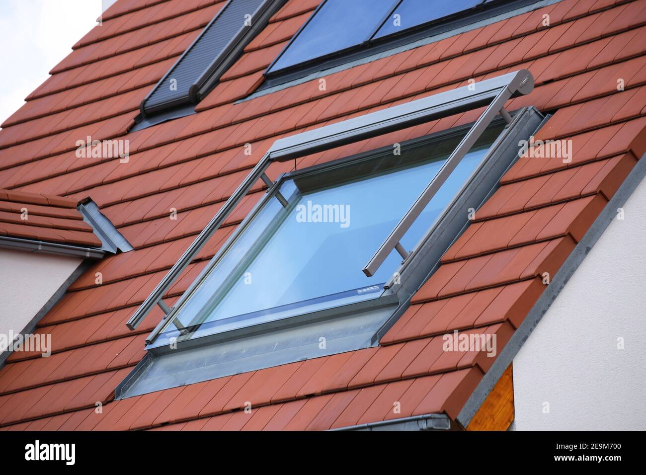 Roof window with awning, exterior shot Stock Photo - Alamy