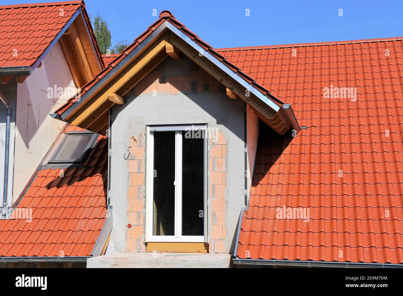 New tiled roof with dormers Stock Photo - Alamy