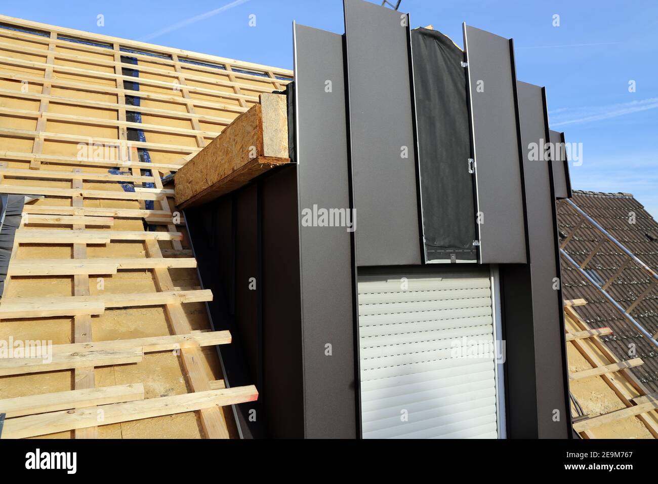 New roof with dormer under construction Stock Photo - Alamy