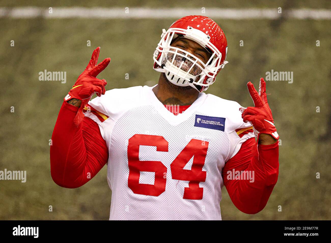 Kansas City Chiefs Defensive Tackle Mike Pennel (64) looks up for a ...
