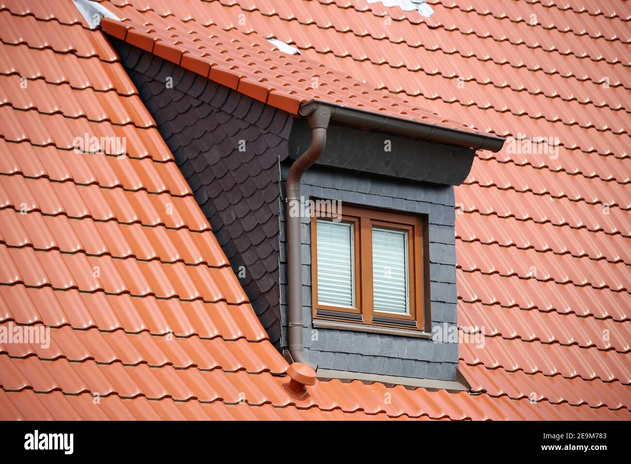 Dormer with slate cladding Stock Photo - Alamy