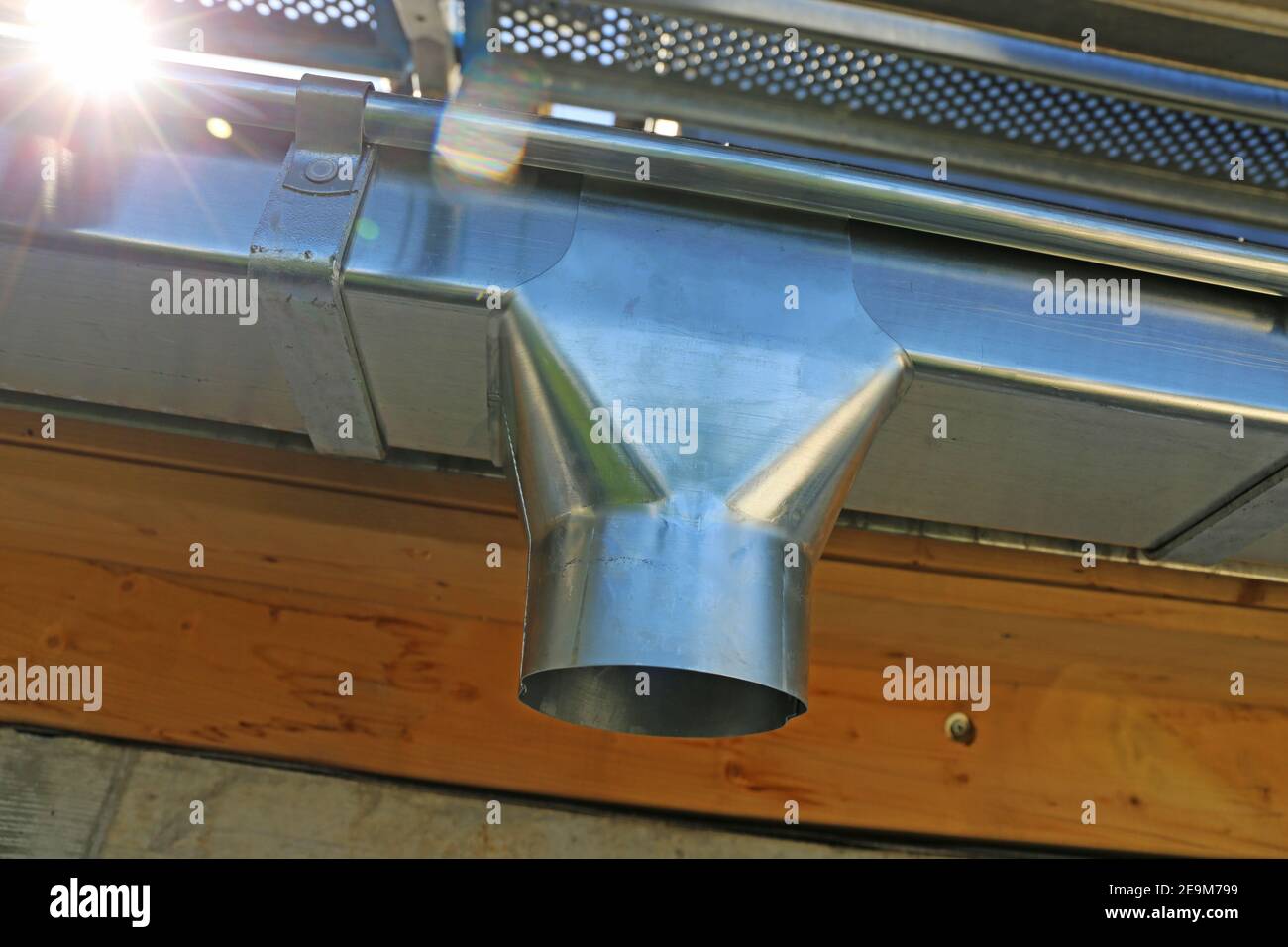 Roof gutter on a new tiled roof Stock Photo - Alamy