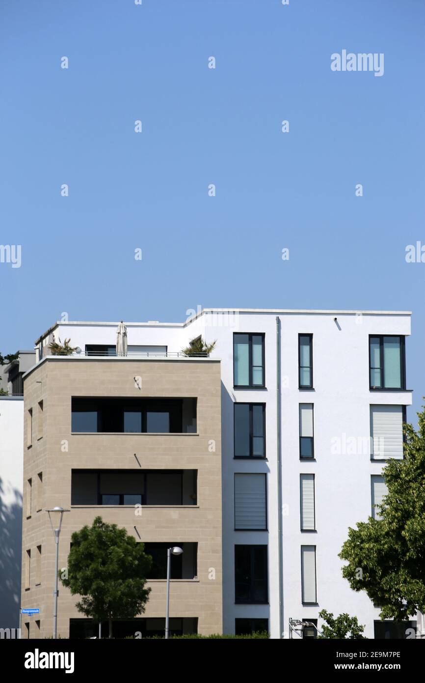 Modern apartment building in urban style Stock Photo - Alamy