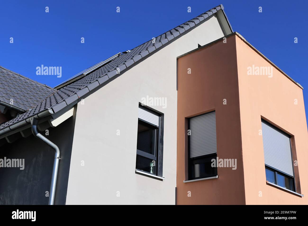 Residential home with modern facade painting Stock Photo - Alamy