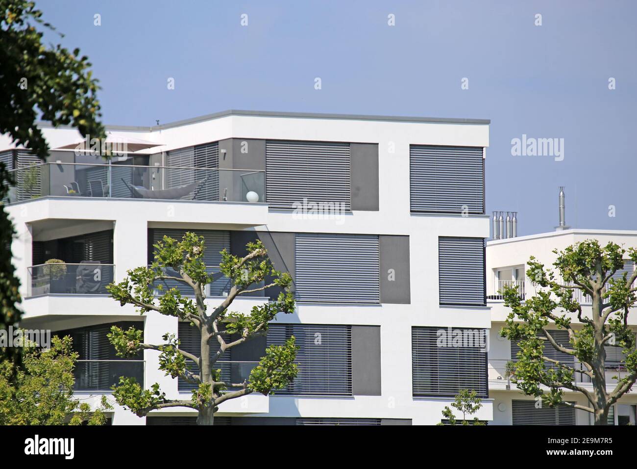 Modern apartment building in urban style Stock Photo - Alamy