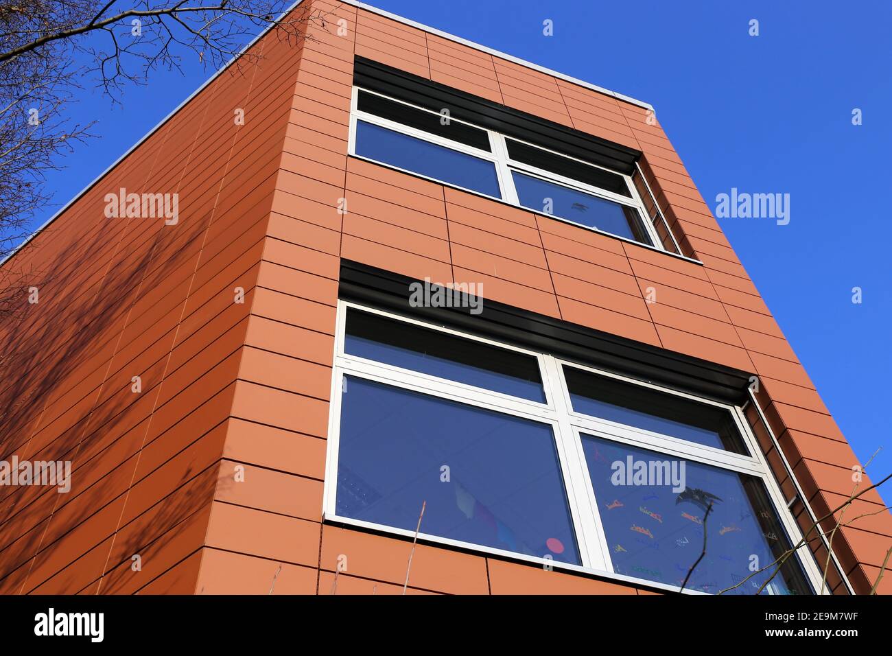Modern building with facade cladding Stock Photo - Alamy