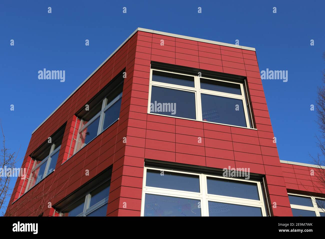 Modern building with facade cladding Stock Photo - Alamy