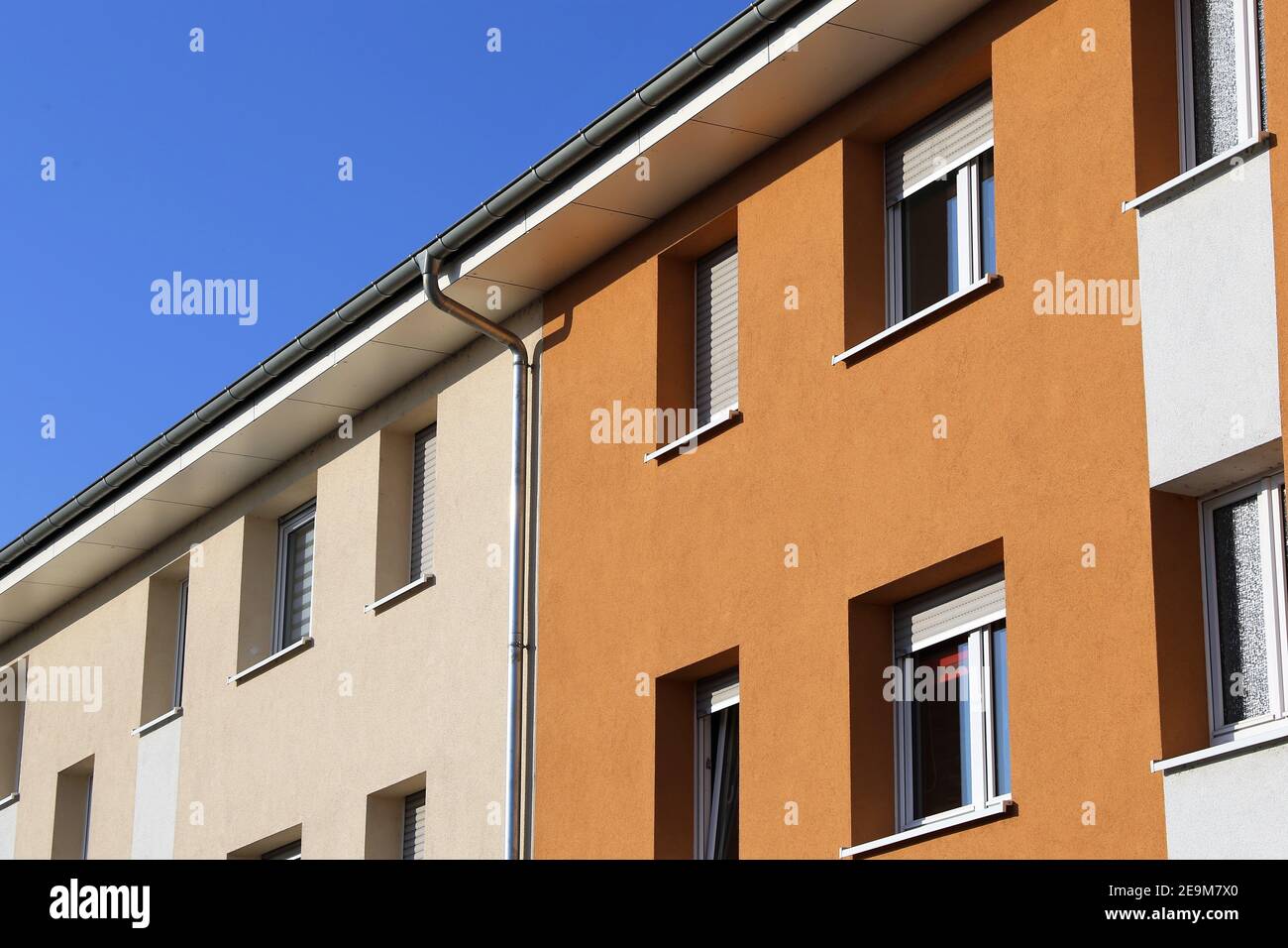 Old apartment building with new facade painting Stock Photo - Alamy