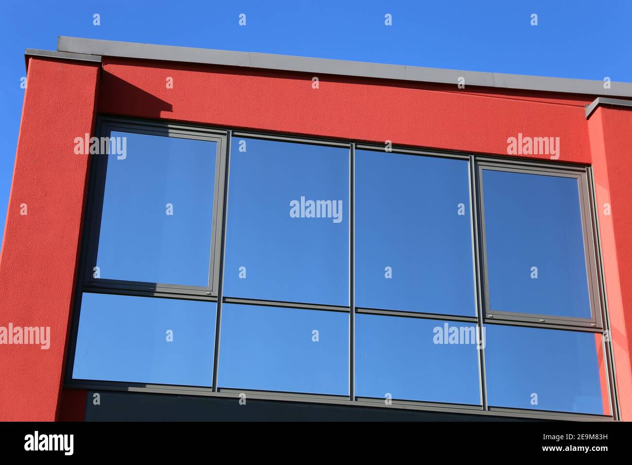 Large window facade on a modern building Stock Photo - Alamy