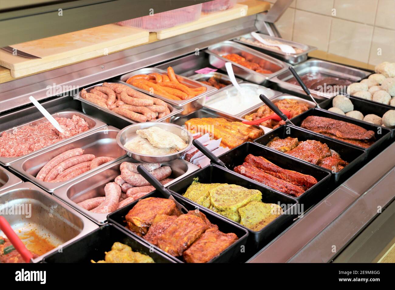 Variety of fine meat products in the butchery Stock Photo - Alamy