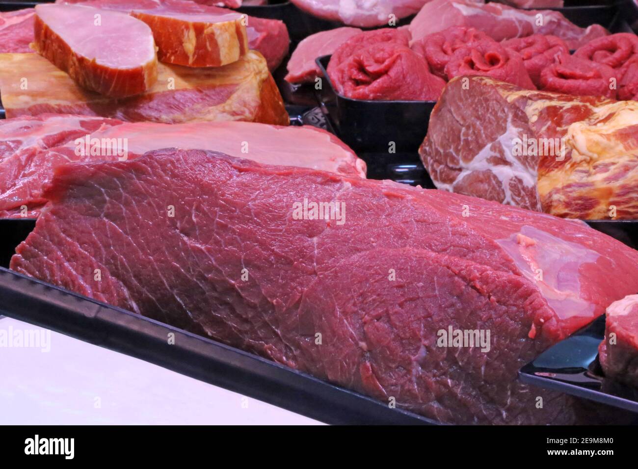 Variety of fine meat products in the butchery Stock Photo - Alamy