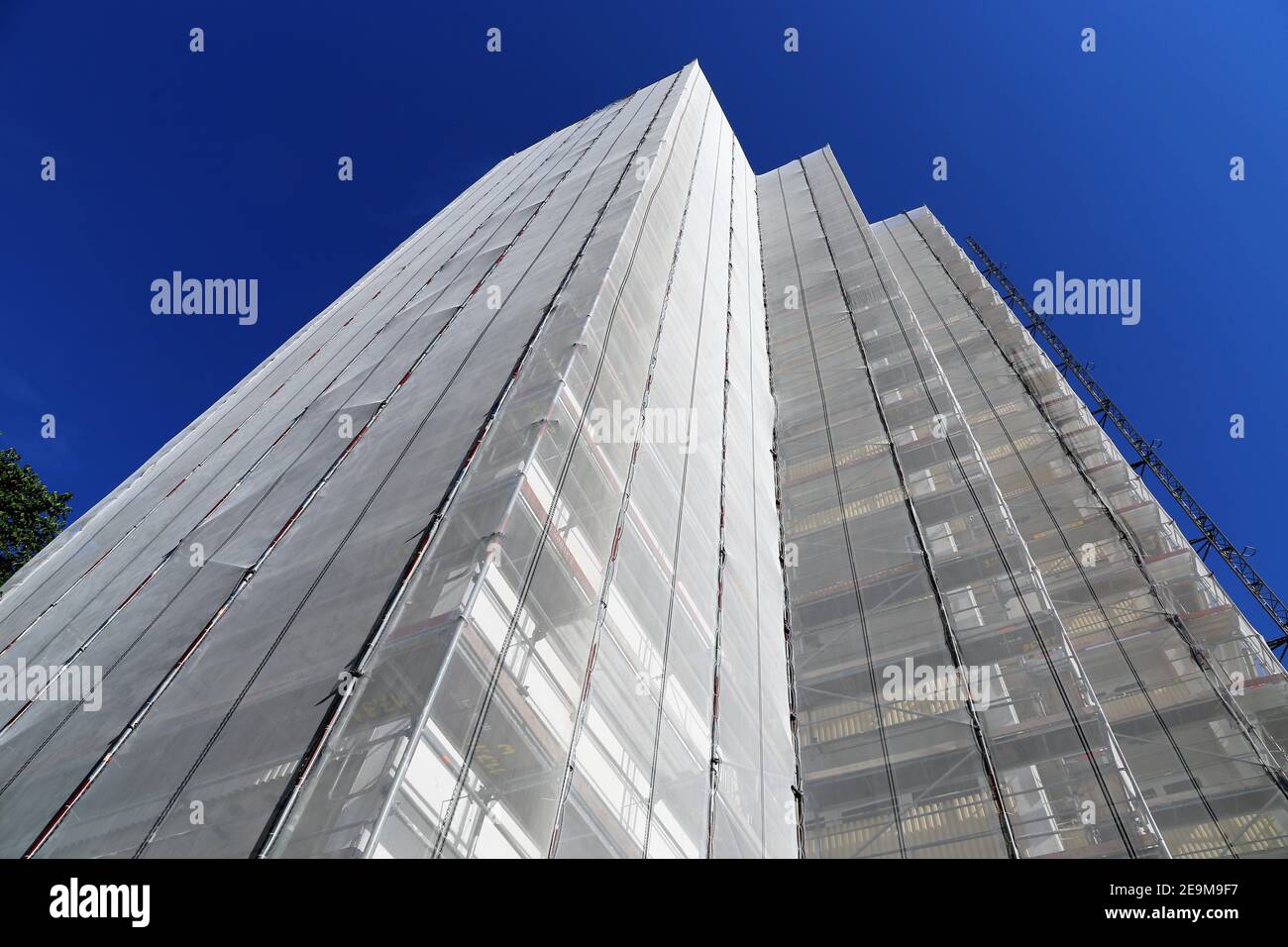 Scaffolding: Scaffolded high rise building (Germany Stock Photo - Alamy