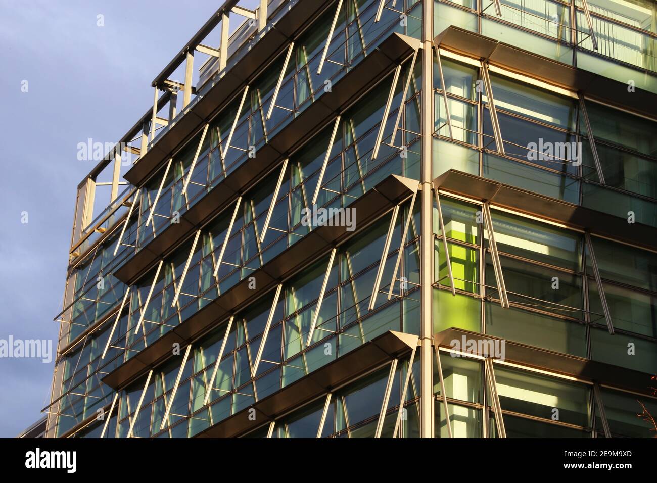 Building with large and modern glass facade Stock Photo - Alamy