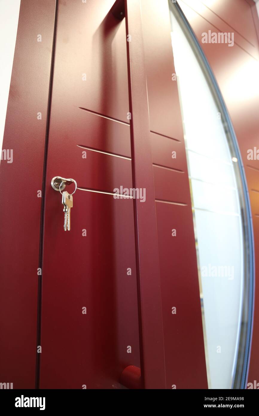 Modern front door with front door keys Stock Photo - Alamy