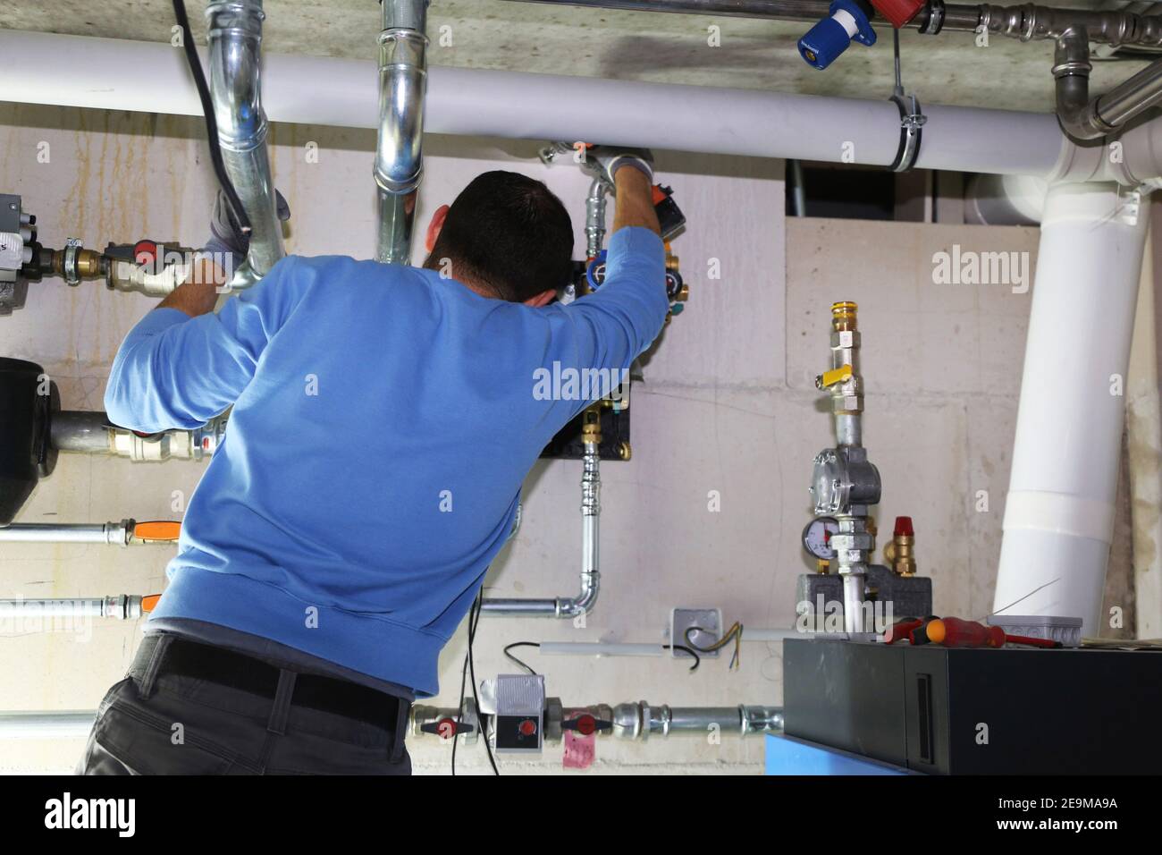 Installation of a heating system in a residential building Stock Photo ...