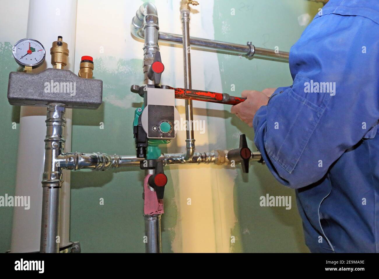Installation of a heating system in a residential building Stock Photo ...