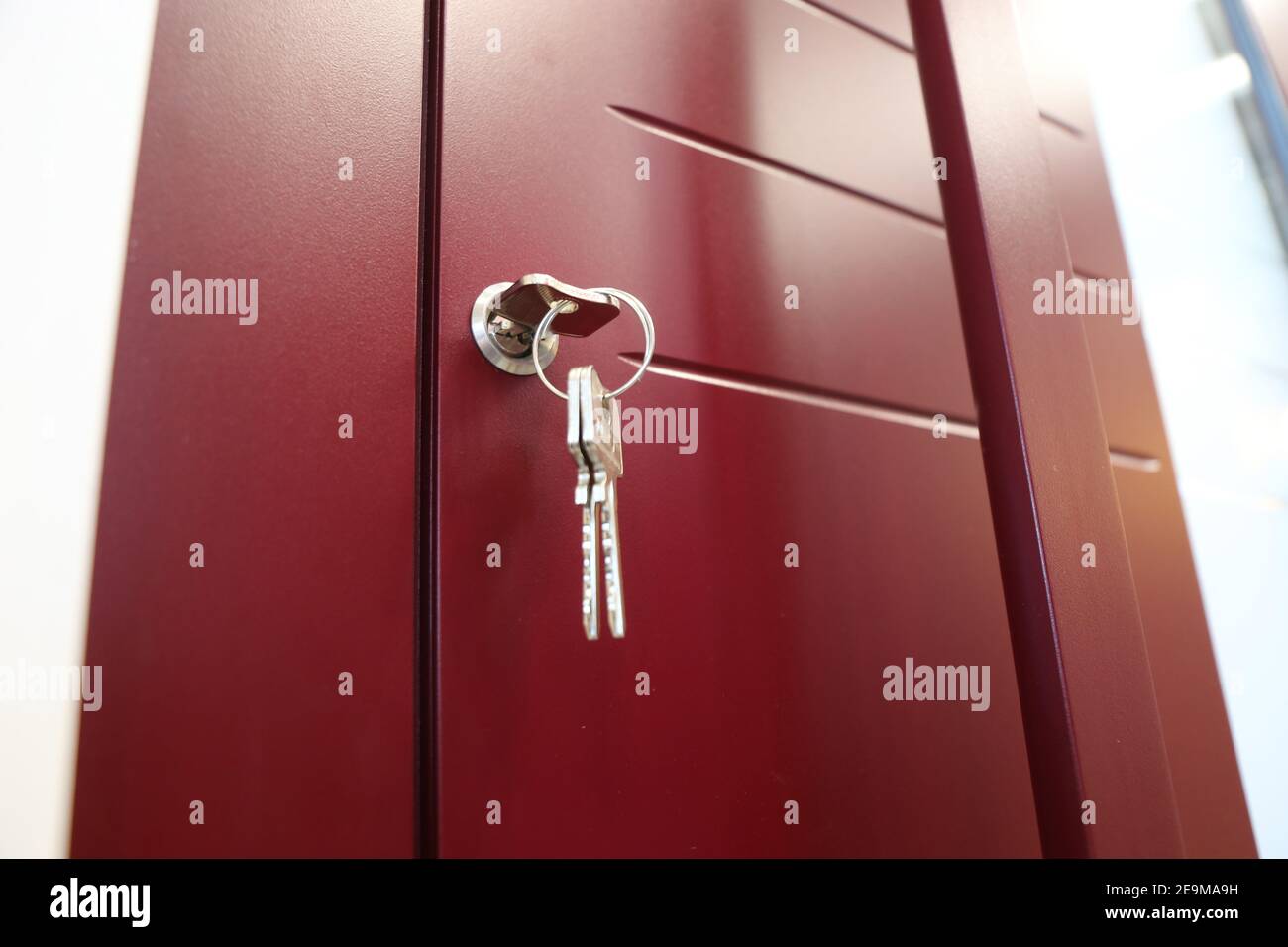 Modern front door with front door keys Stock Photo - Alamy