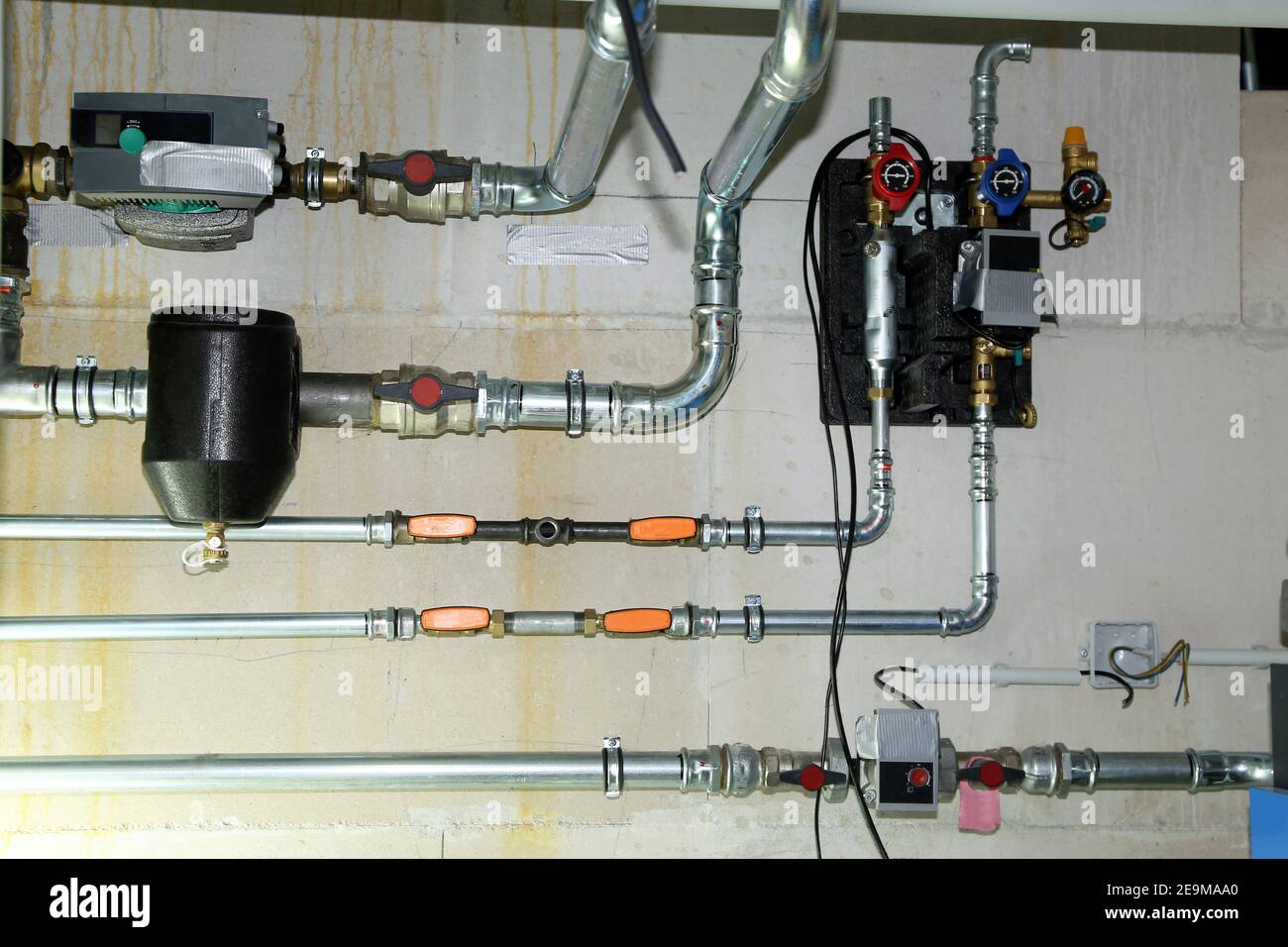 Installation of a heating system in a residential building Stock Photo ...