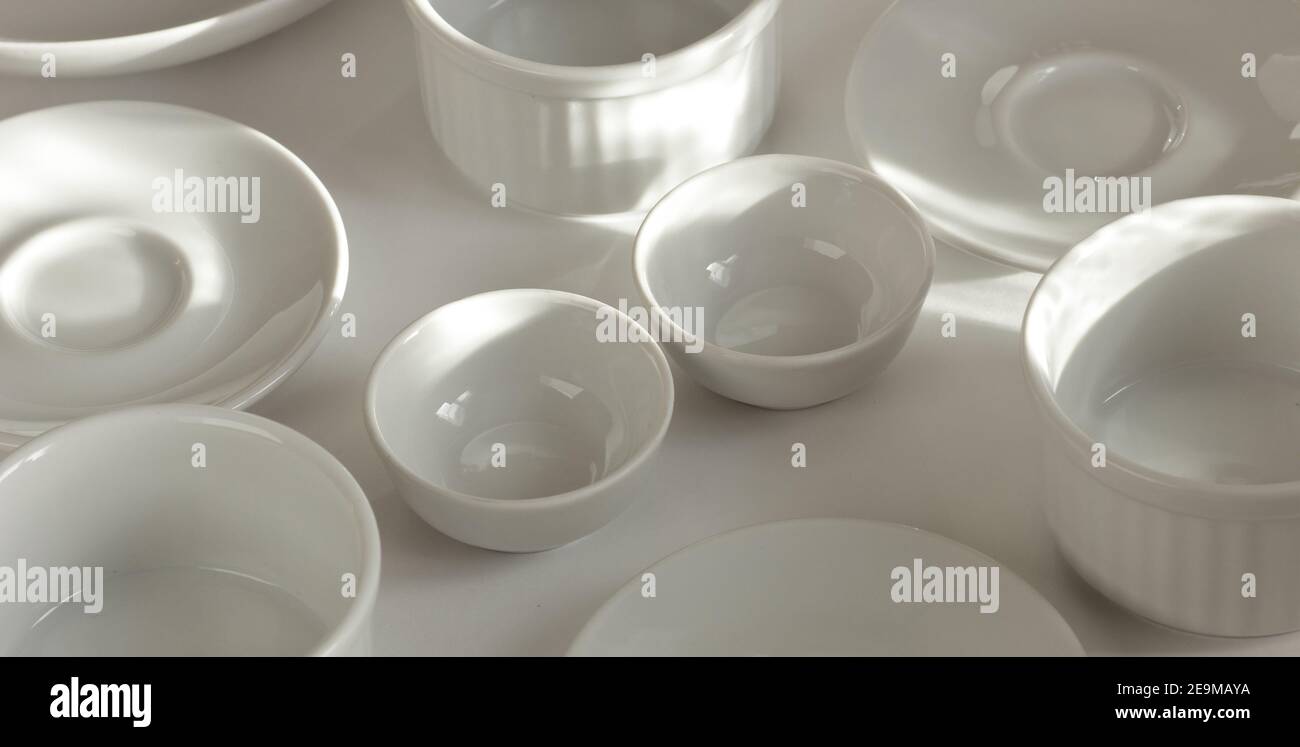 Minimalist dish and plate white pattern on white background, tableware ...