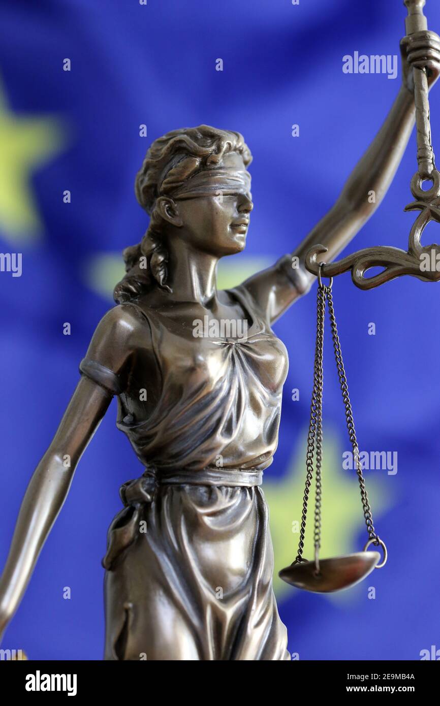 Symbol image: Justitia in front of a Europe flag Stock Photo - Alamy