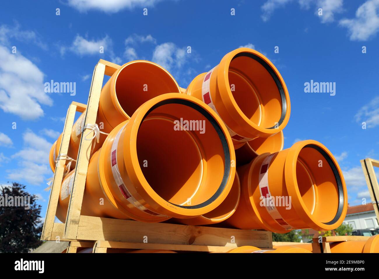 Pile of tubes (kg sewer pipes) on a building site Stock Photo - Alamy