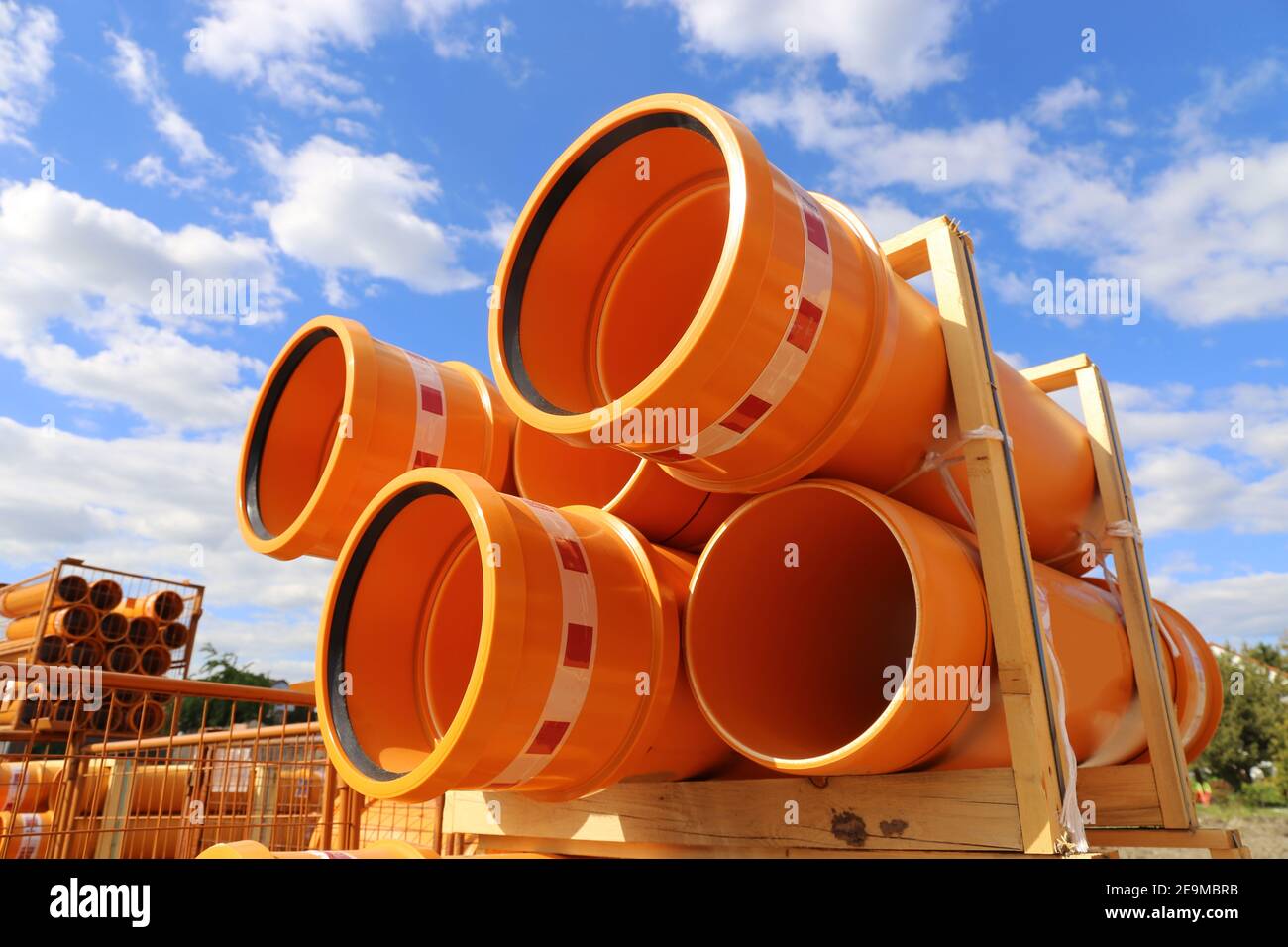Pile of tubes (kg sewer pipes) on a building site Stock Photo - Alamy