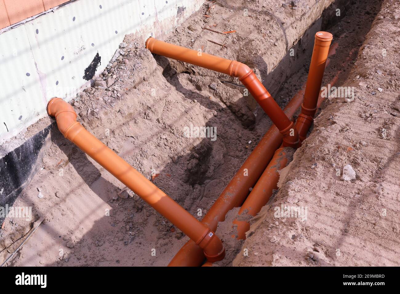 KG sewer pipes on a residential building under construction Stock Photo ...