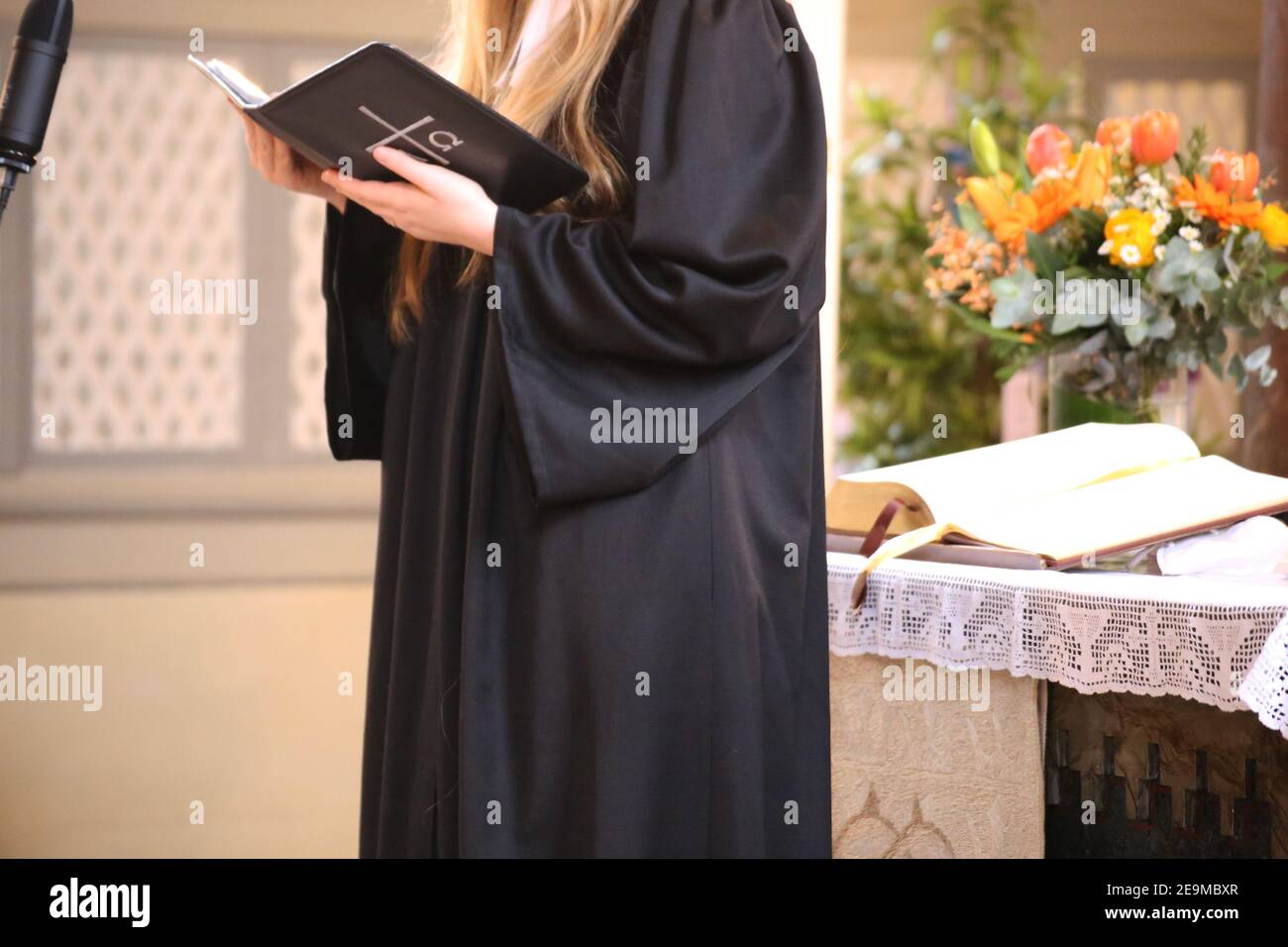 Female Vicar holds service in a Protestant church Stock Photo - Alamy