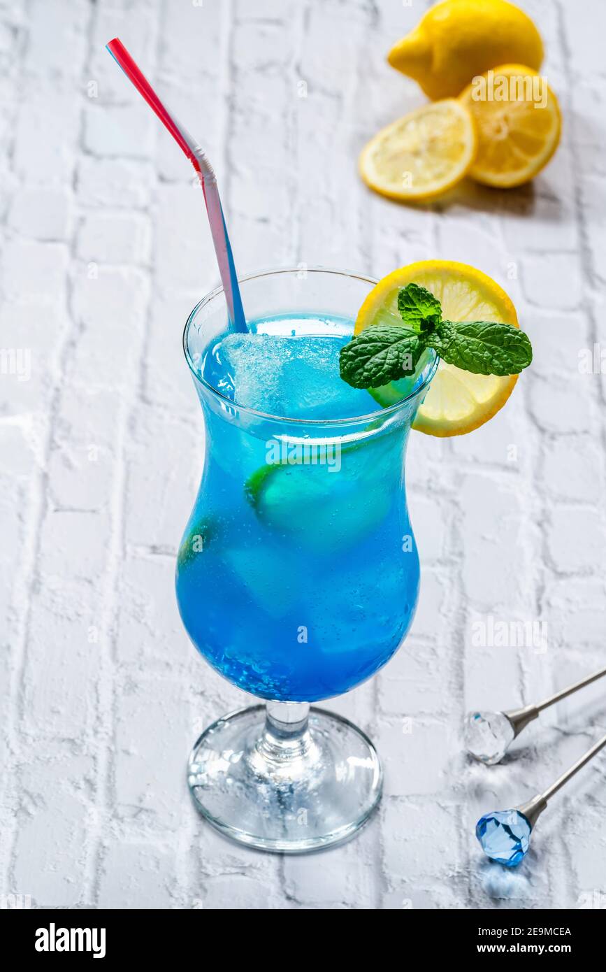 Blue Lagoon cocktail of blue curacao syrup mixed with vodka and ...