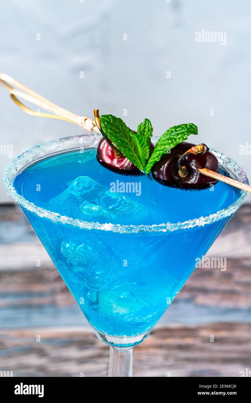 Blue Lagoon cocktail of blue curacao syrup mixed with vodka and ...