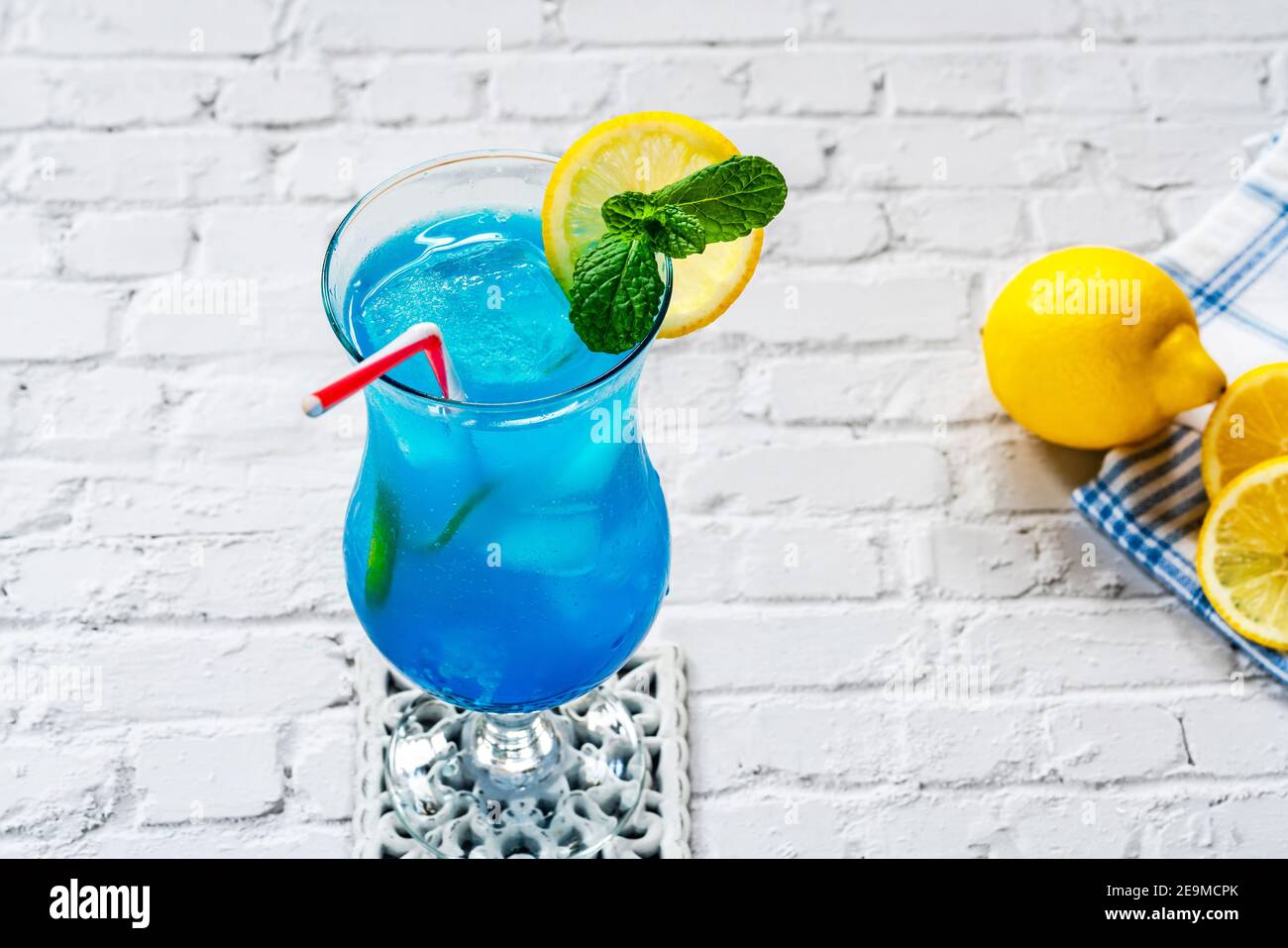 Blue Lagoon cocktail of blue curacao syrup mixed with vodka and ...