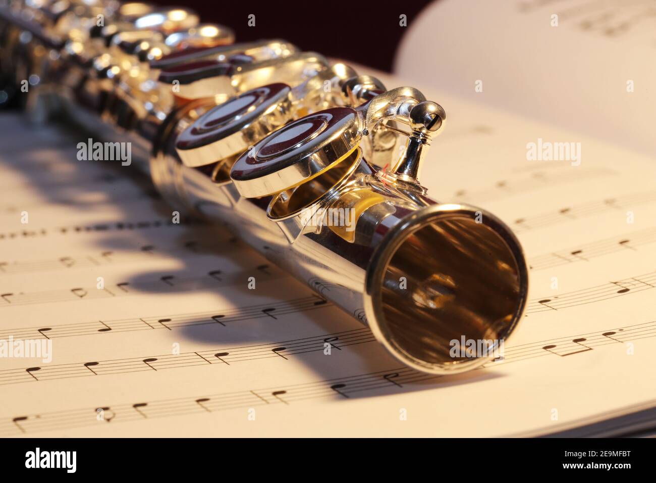 Symbol image: Transverse flute on music notebook Stock Photo - Alamy