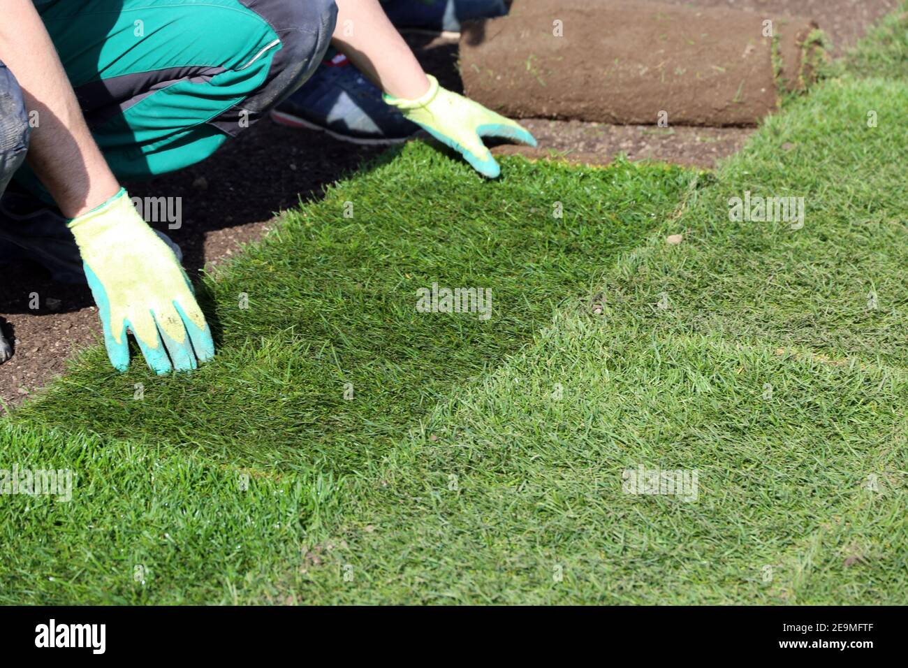 Rolled turf hi-res stock photography and images - Alamy