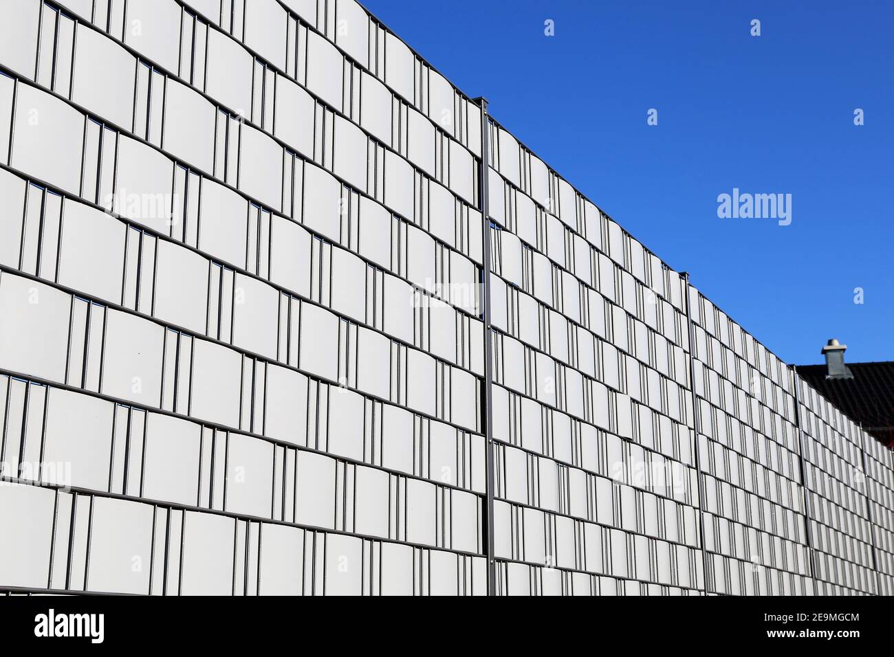Modern new privacy fence as a boundary of the property Stock Photo - Alamy