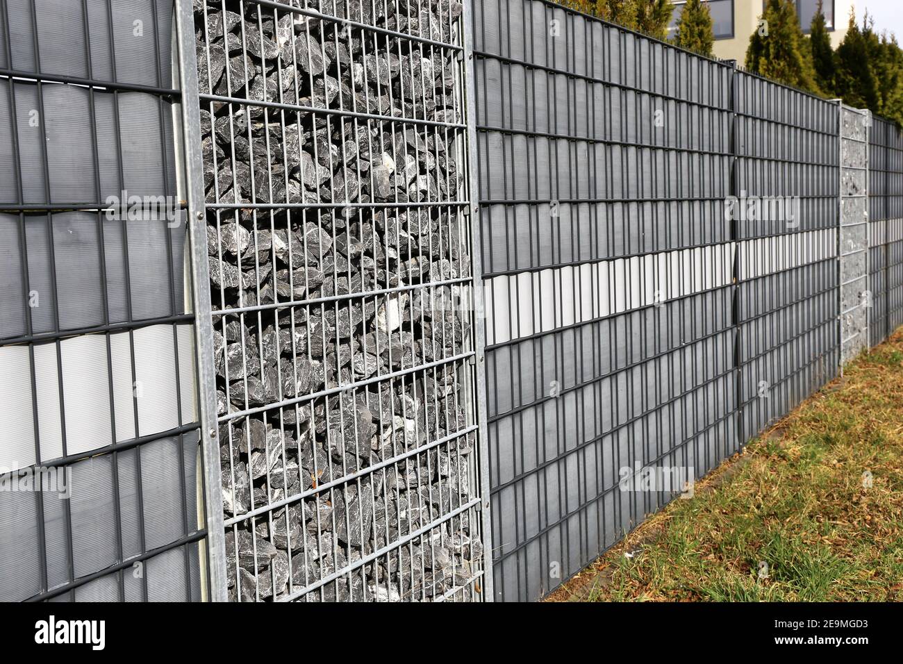 Modern new privacy fence as a boundary of the property Stock Photo - Alamy